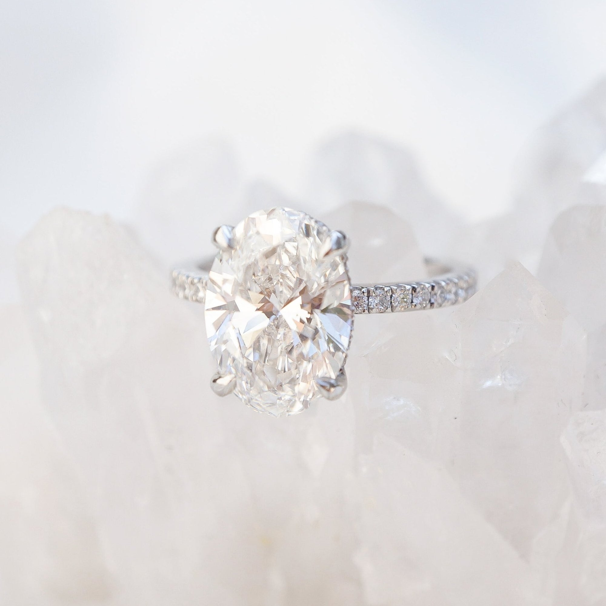 Oval Accented Solitaire with Hidden Halo
